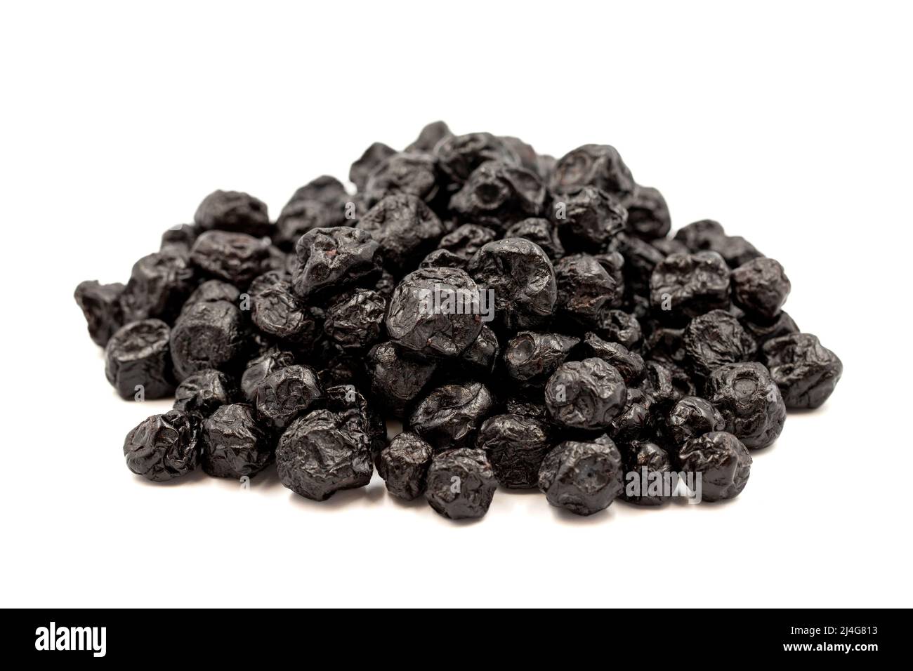Dried blueberries isolated on a white background. Bulk blueberries ...