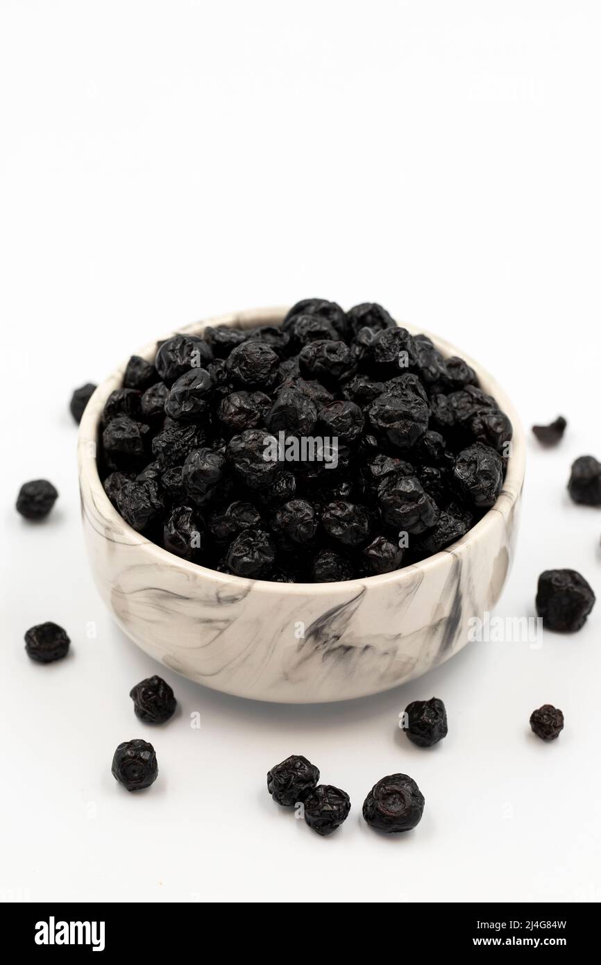 Dried blueberries isolated on a white background. Bulk blueberries ...