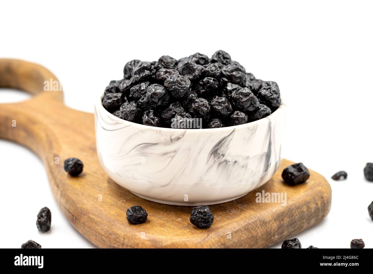 Dried blueberries isolated on a white background. Bulk blueberries ...
