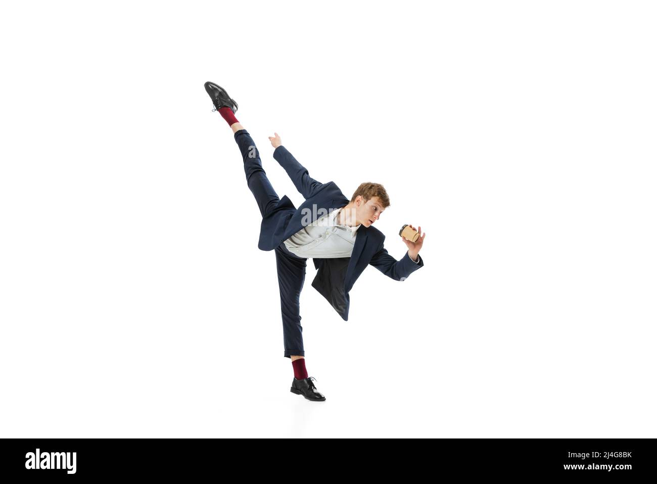 Man in office style clothes dancing with coffee to go isolated on white ...