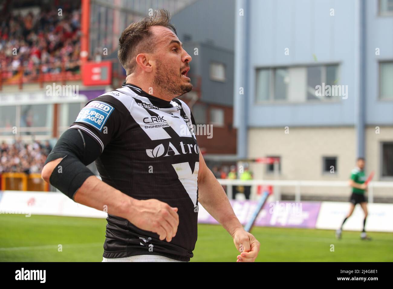 Josh Reynolds #6 of Hull FC celebrates his try in front of the Hull FC ...