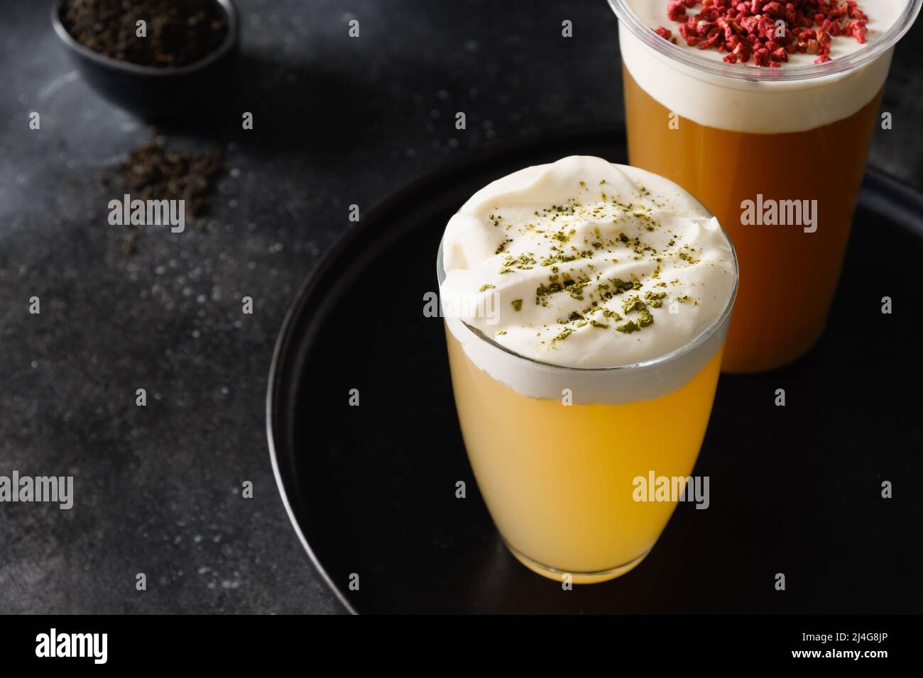 Cheese tea in glasses made of green tea and black tea with whipped ...
