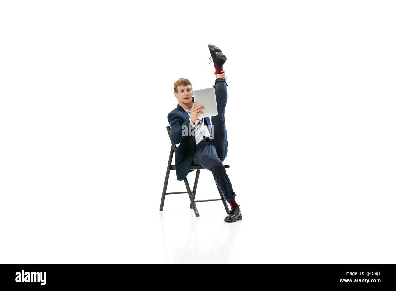 Silhouette man sitting on chair Cut Out Stock Images & Pictures - Alamy