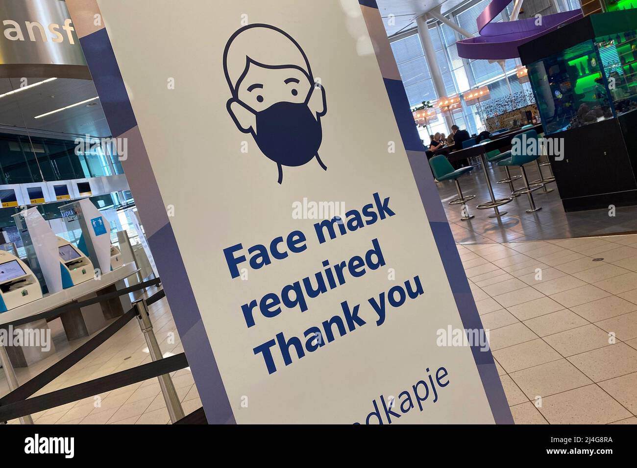 Sign FACE MASK REQUIRED THANK YOU at Schiphol Airport in Amsterdam on ...
