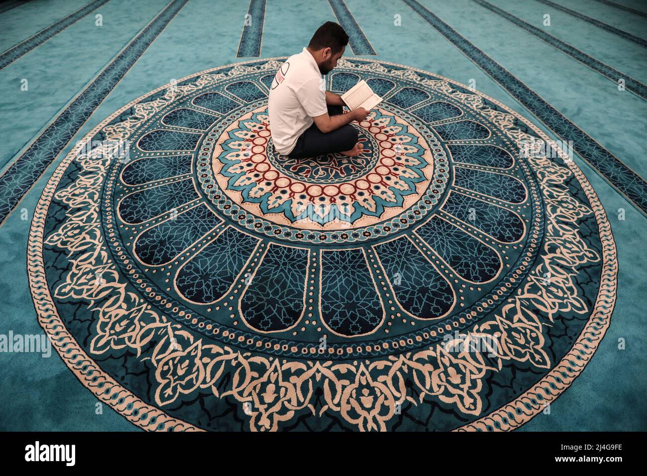 Baghdad, Iraq. 15th Apr, 2022. An Iraqi man reads Quran in Sheikh Abdul ...