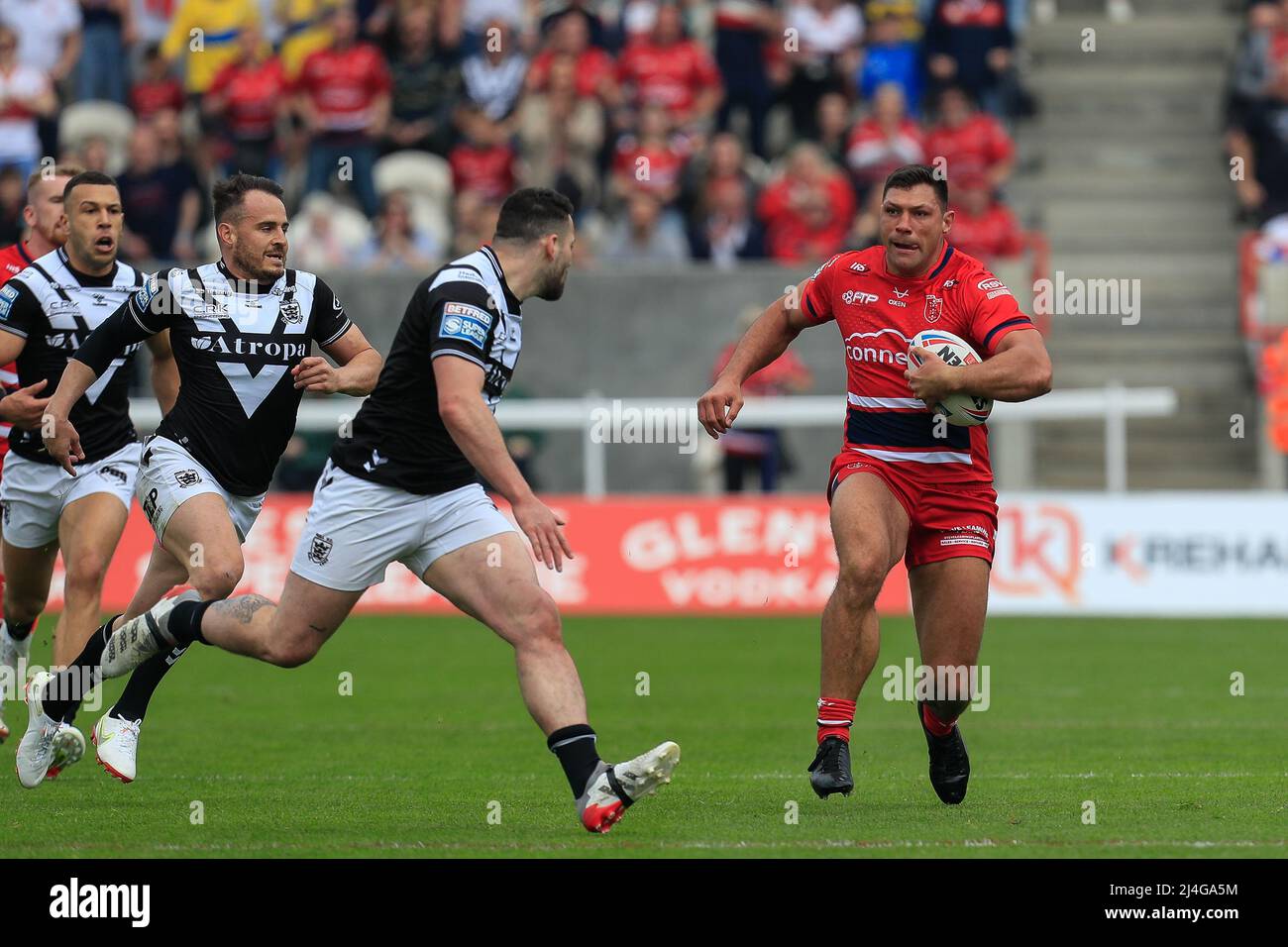 Jake Connor #1 of Hull FC goes in to tackle Ryan Hall (5) of Hull KR ...