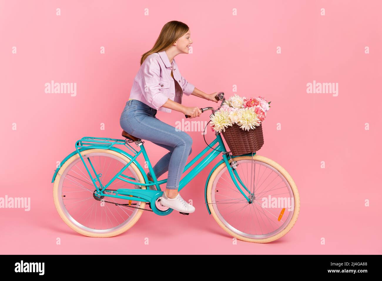 Profile photo of cheerful lady ride bike deliver flowers hurry shopping ...