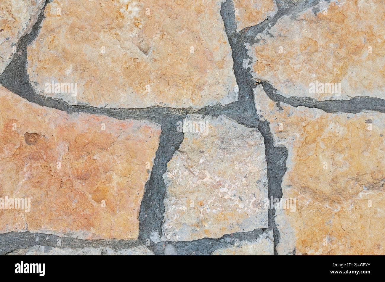 Stone wall close-up. Background image Stock Photo - Alamy