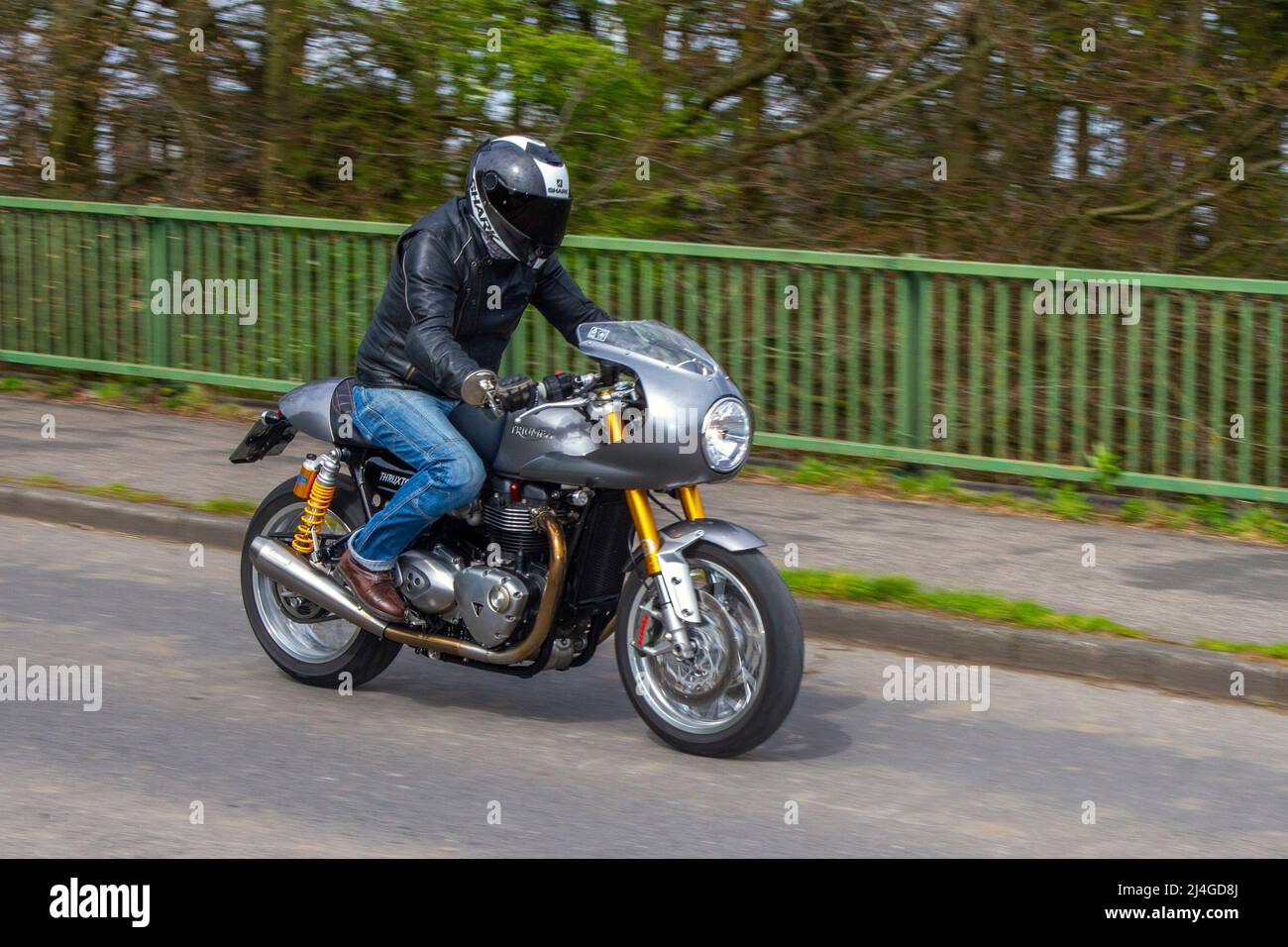 Man riding cafe racer motorcycle hi-res stock photography and images ...