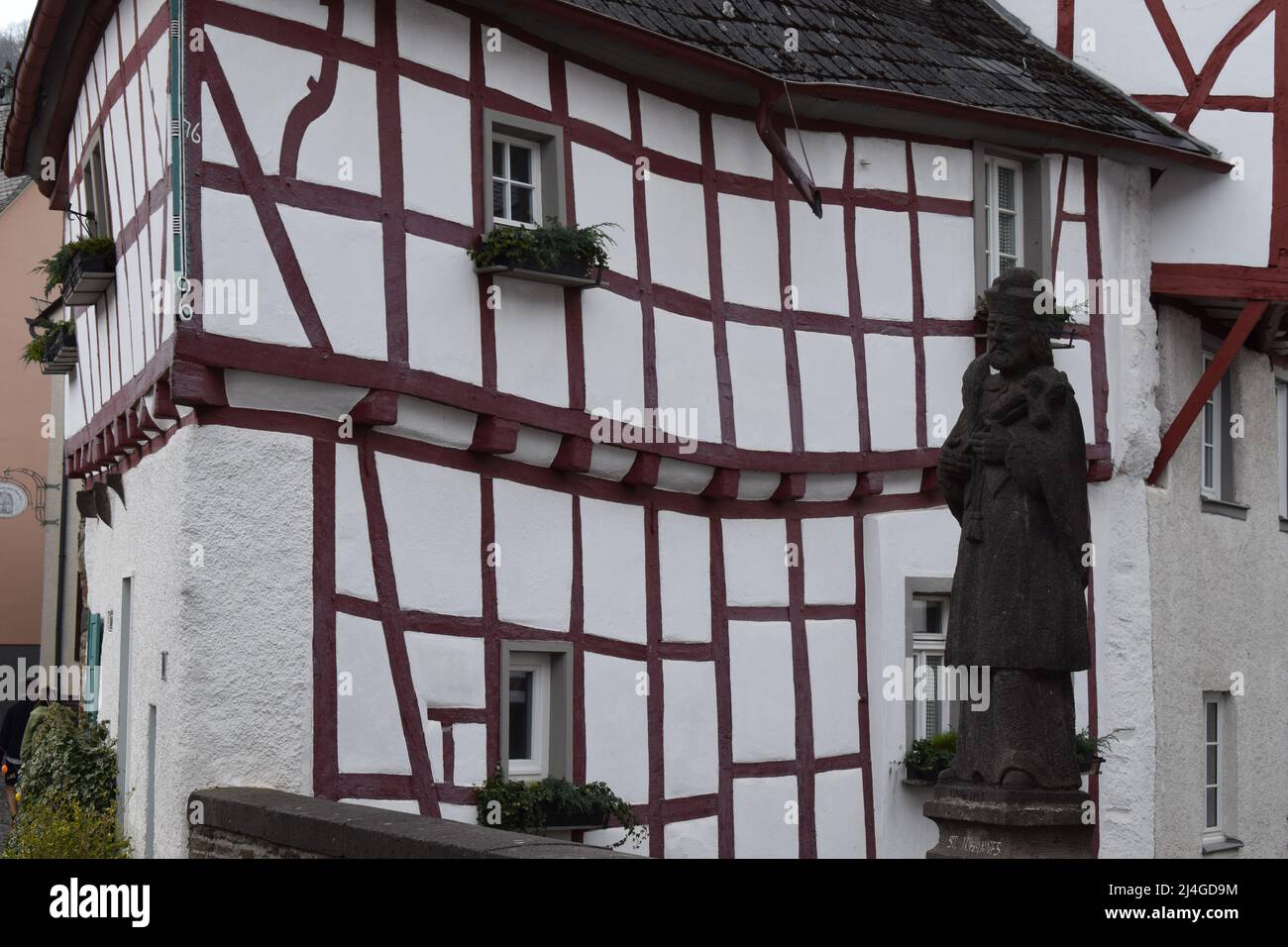 medieval statue on the Elz bridge in Monreal Stock Photo - Alamy