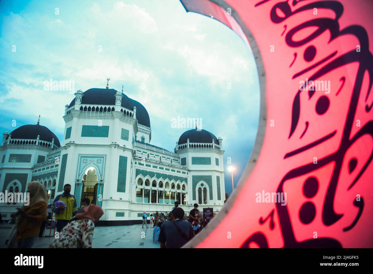 Muslims are seen waiting for the time to break their fast in the holy ...