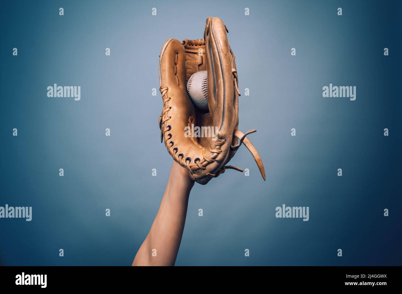 Hand in baseball glove catching hi-res stock photography and images - Alamy