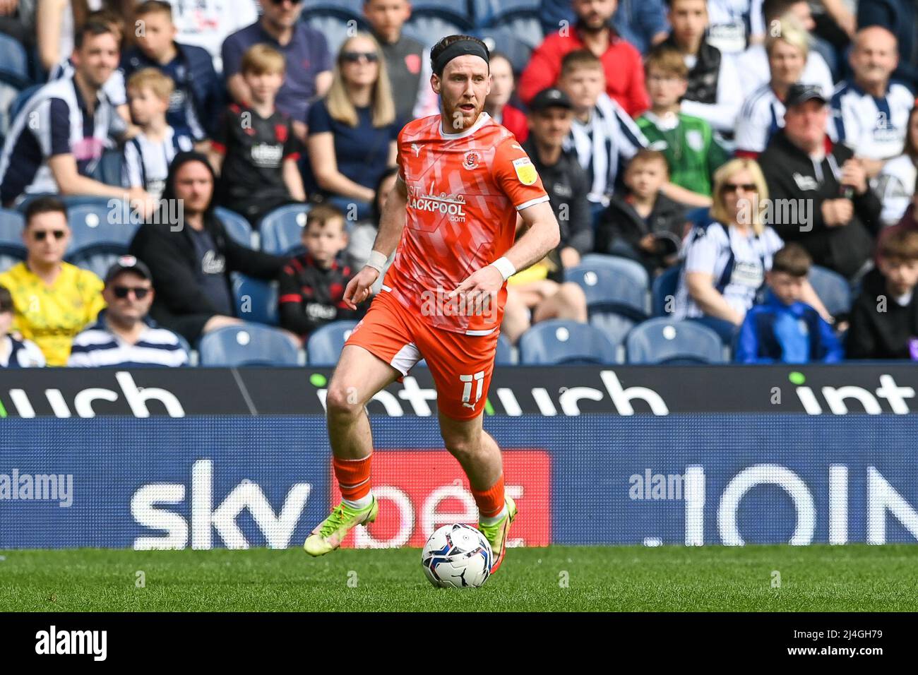 Josh Bowler #11 of Blackpool makes a break with the ball Stock Photo ...