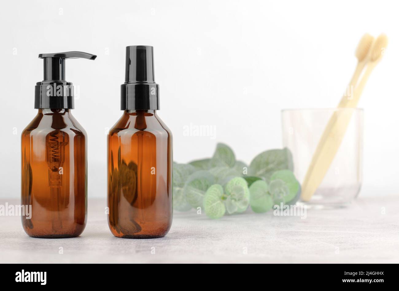 Cosmetic bottles in the bathroom. Skin care product, after shower ...