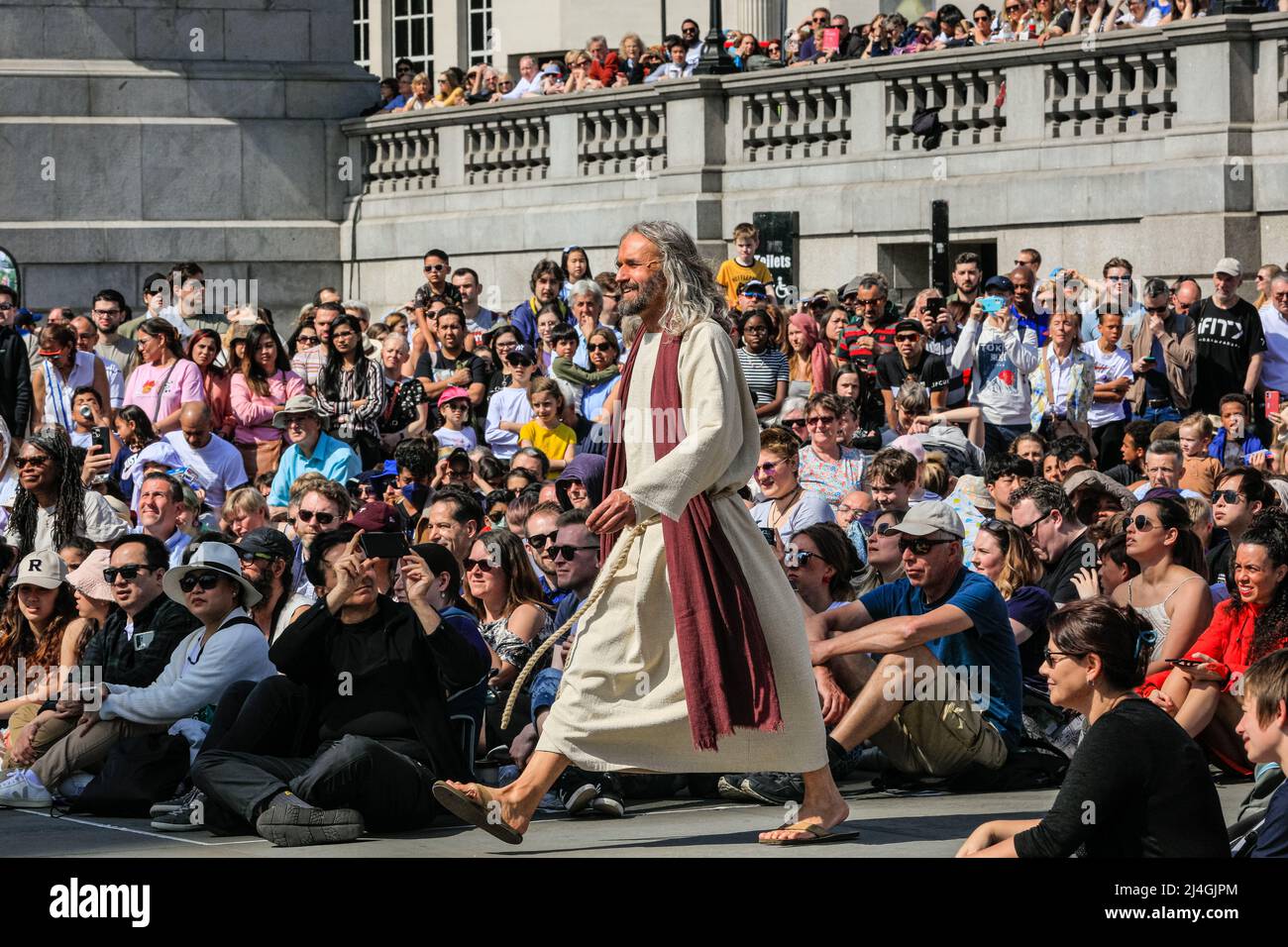 Trafalgar Square, London, UK. 15th Apr, 2022. Jesus walks through the ...