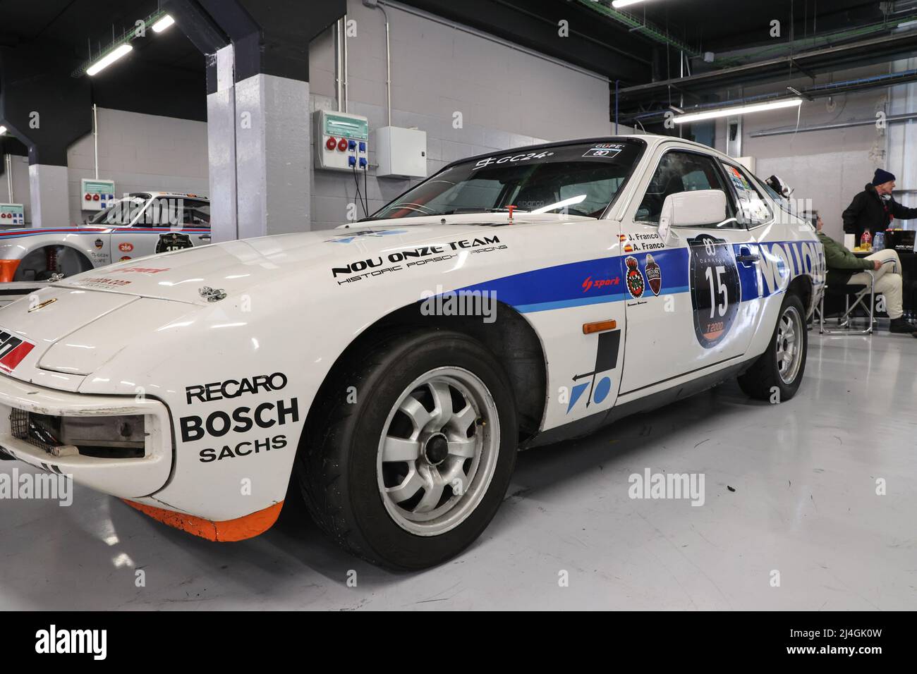 Porsche 924 race car in team garage at Espiritu de Montjuic historic ...