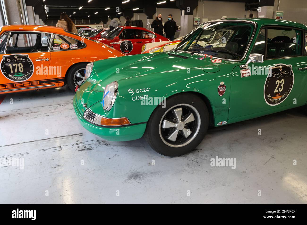 Porsche 911 race car in team garage at Espiritu de Montjuic historic ...