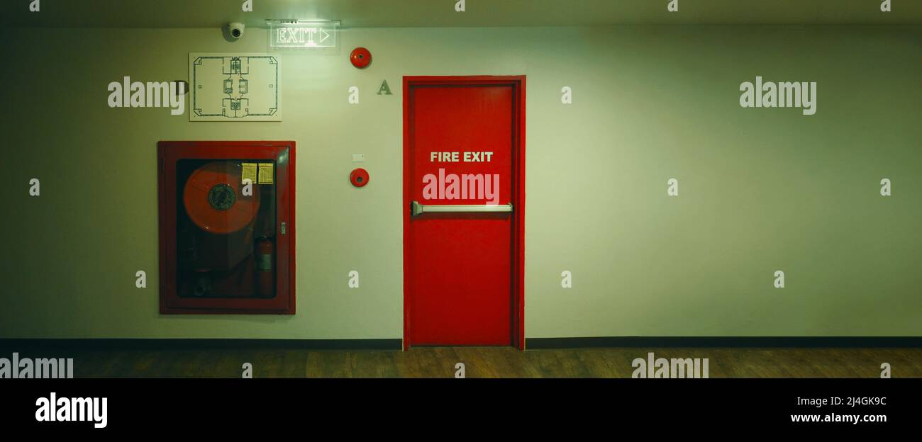 Fire exit door. Fire exit emergency door red color metal material with ...