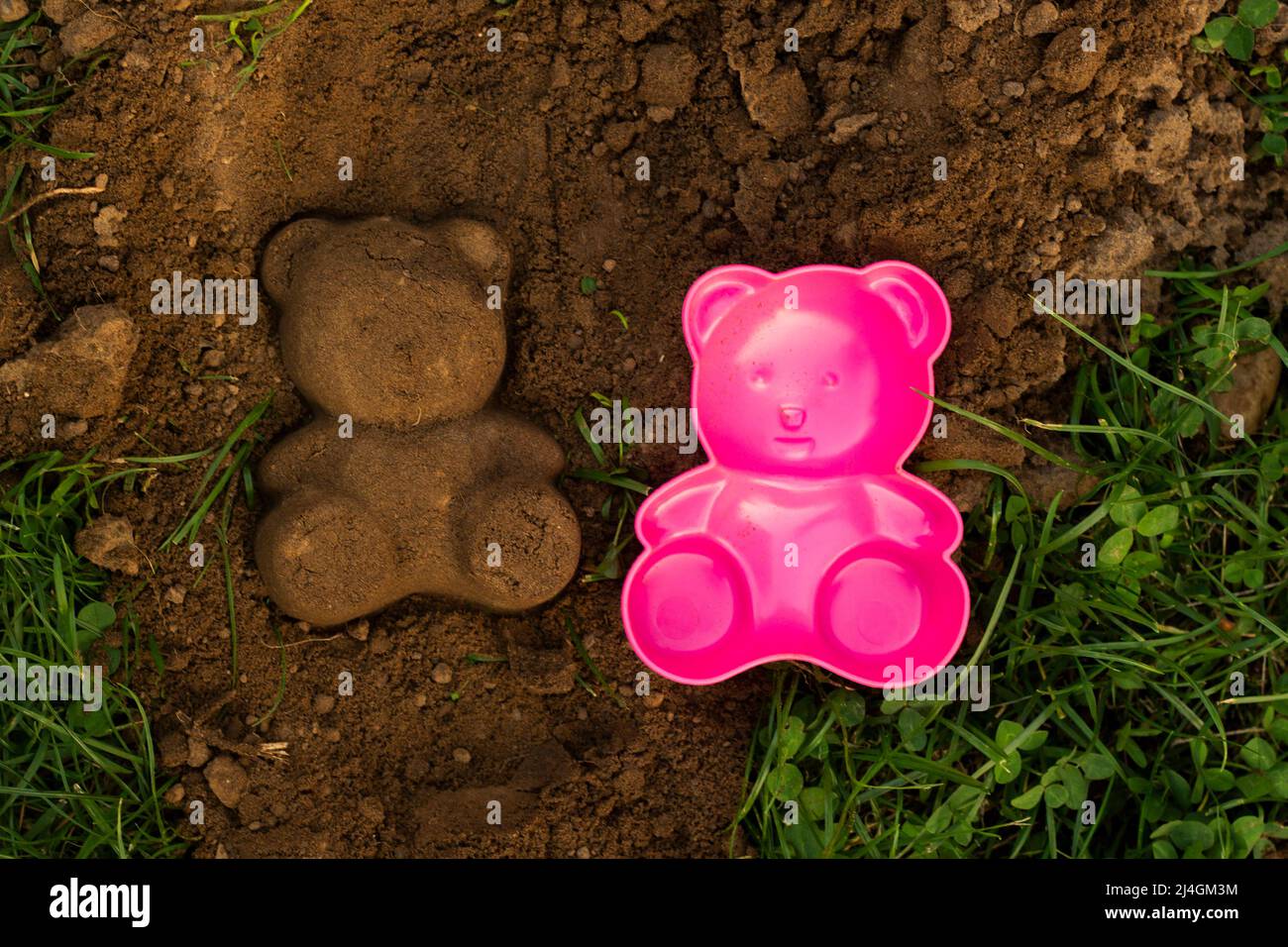 Pink sand toy Stock Photo - Alamy