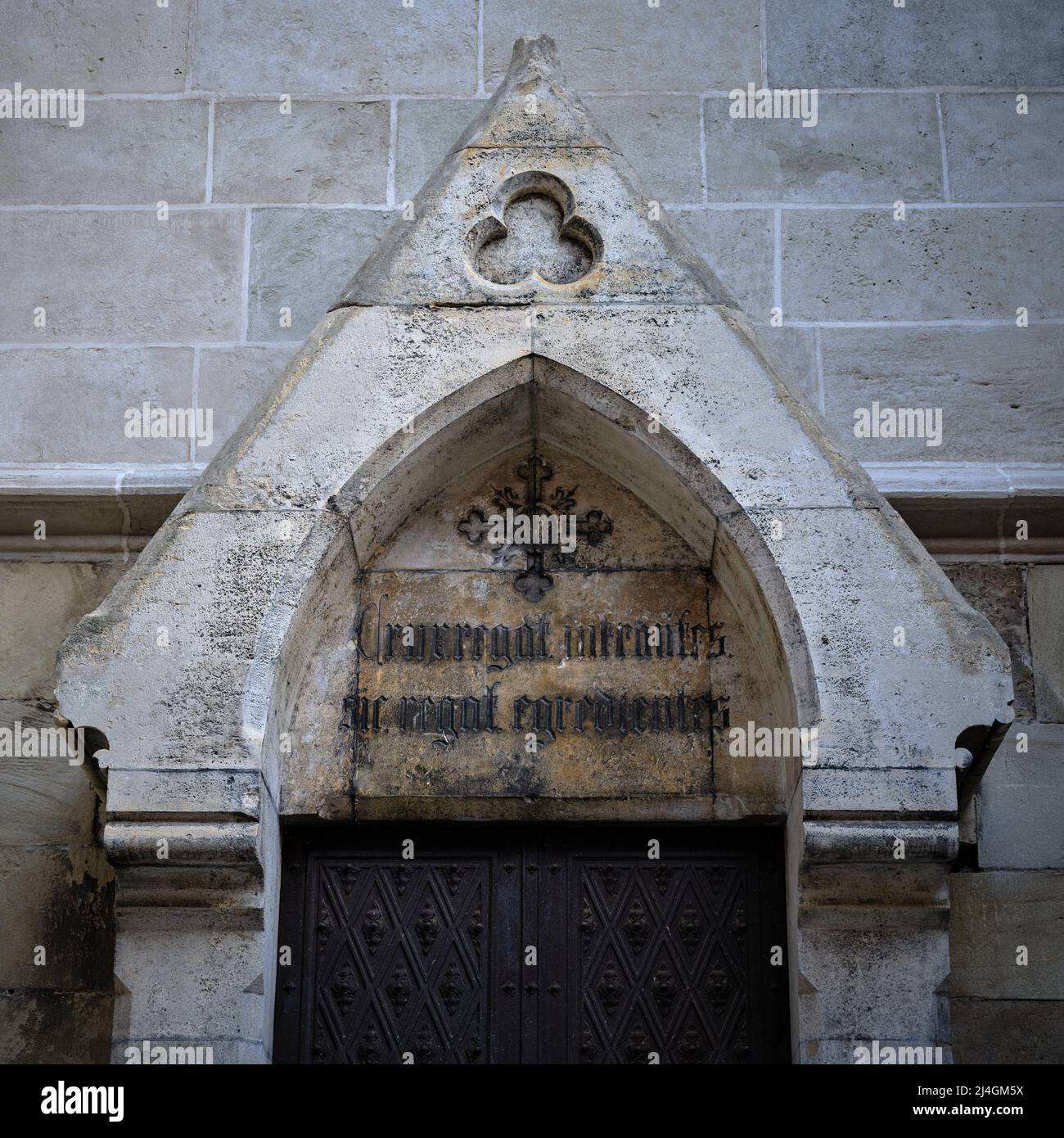 A mysterious inscription above the small side door of the cathedral ...