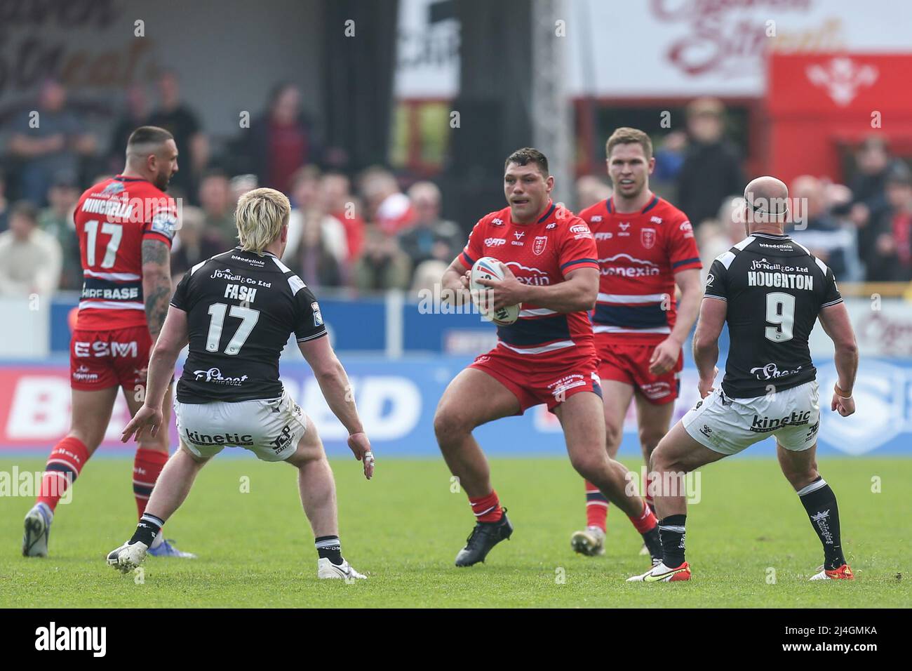 Ryan Hall #5 of Hull KR looks to go past Brad Fash #17 of Hull FC Stock ...
