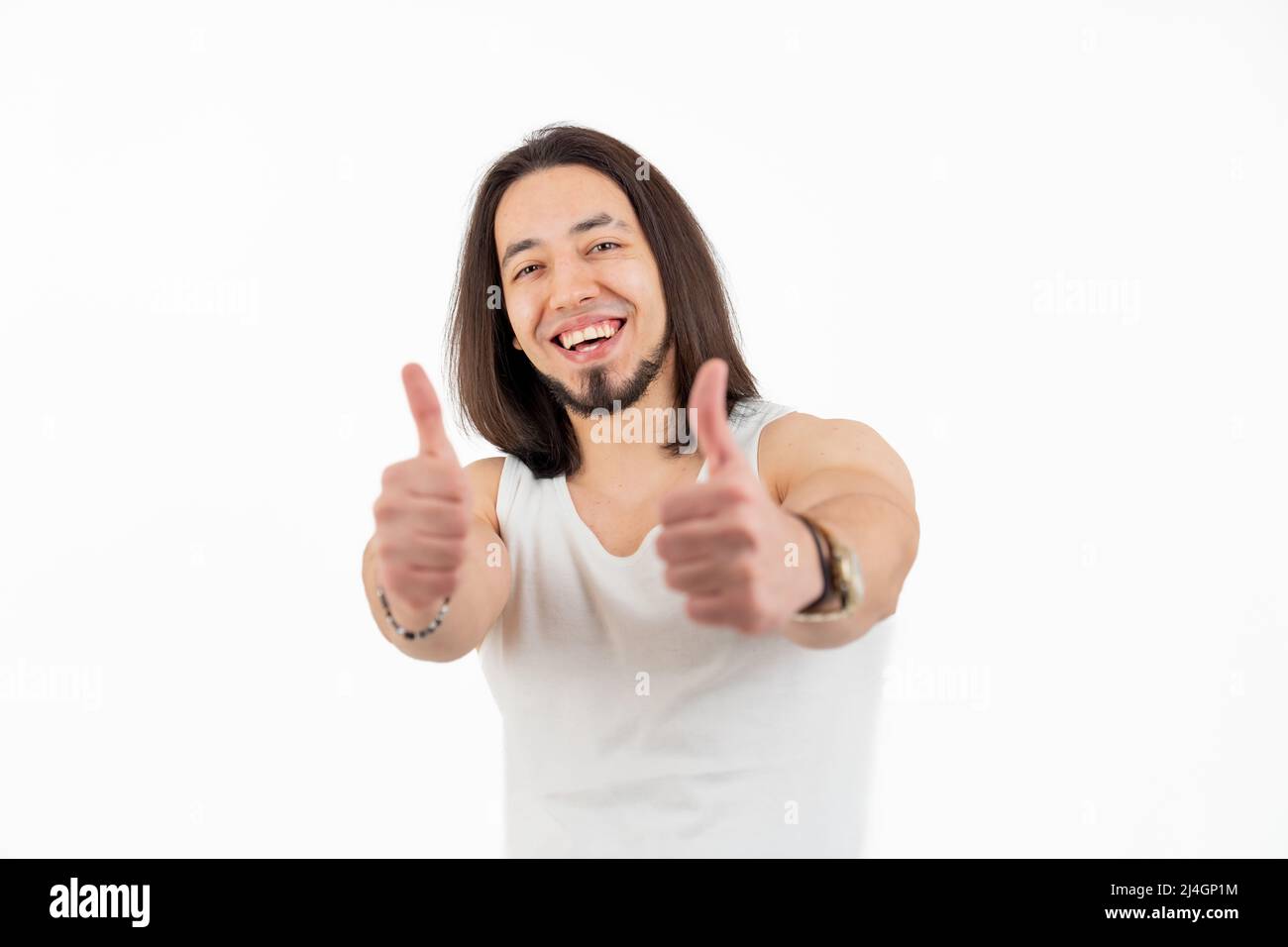 Smiling guy showing thumbs up hi-res stock photography and images - Alamy