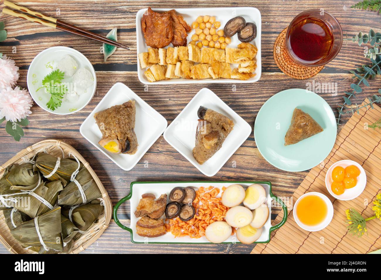 rice dumpling is a traditional Chinese rice dish made of glutinous rice ...