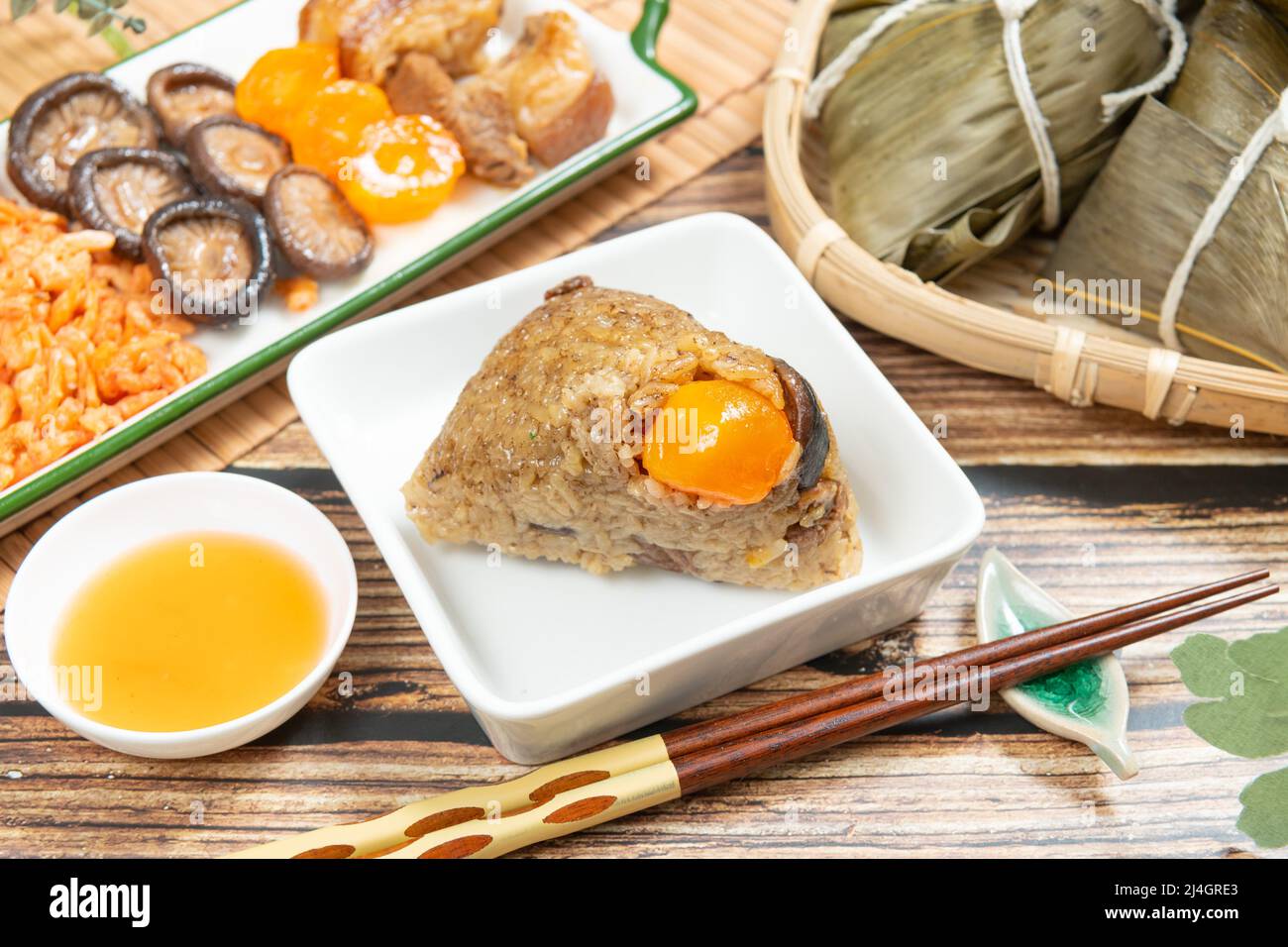 rice dumpling is a traditional Chinese rice dish made of glutinous rice ...