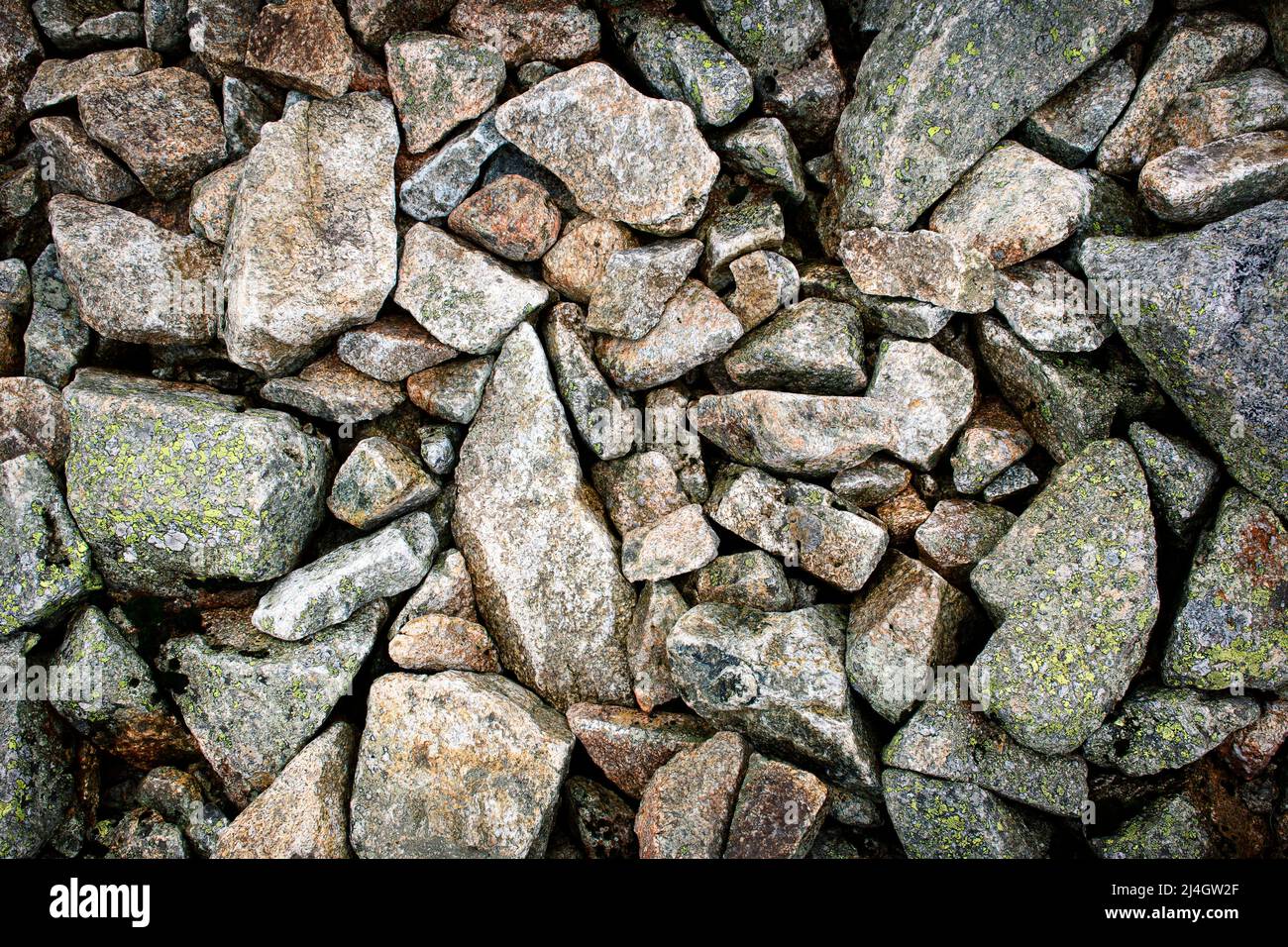 background or texture detail of a group of rubble stone Stock Photo - Alamy