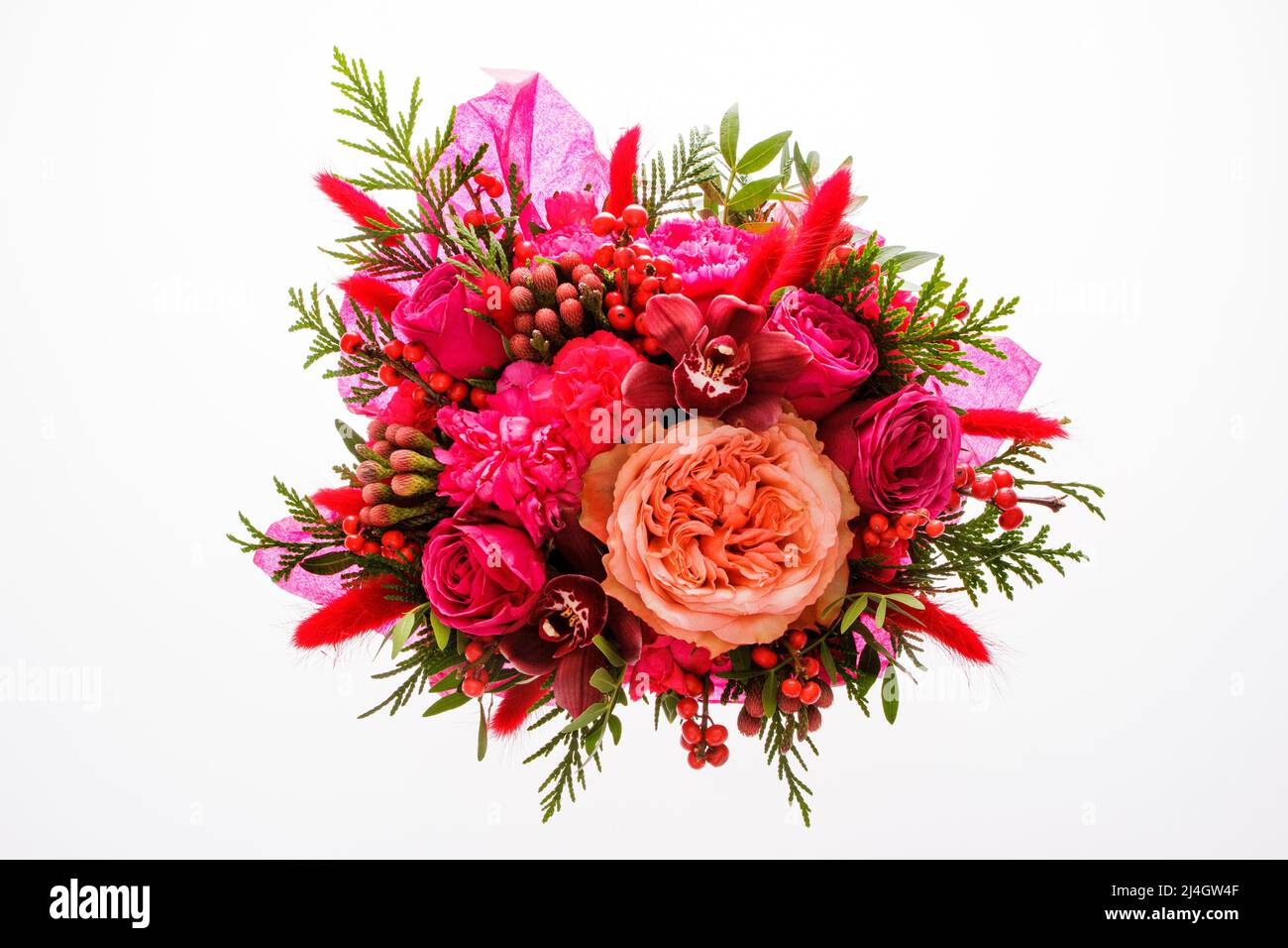 Festive floral arrangement on a white isolated background. Top view ...