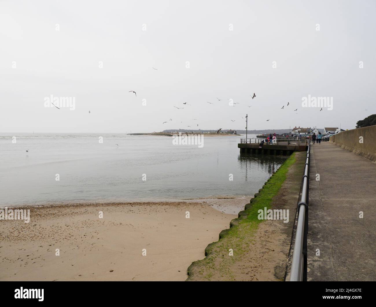 Mudeford Quay looking across the water to the Spit, Dorset, UK Stock ...