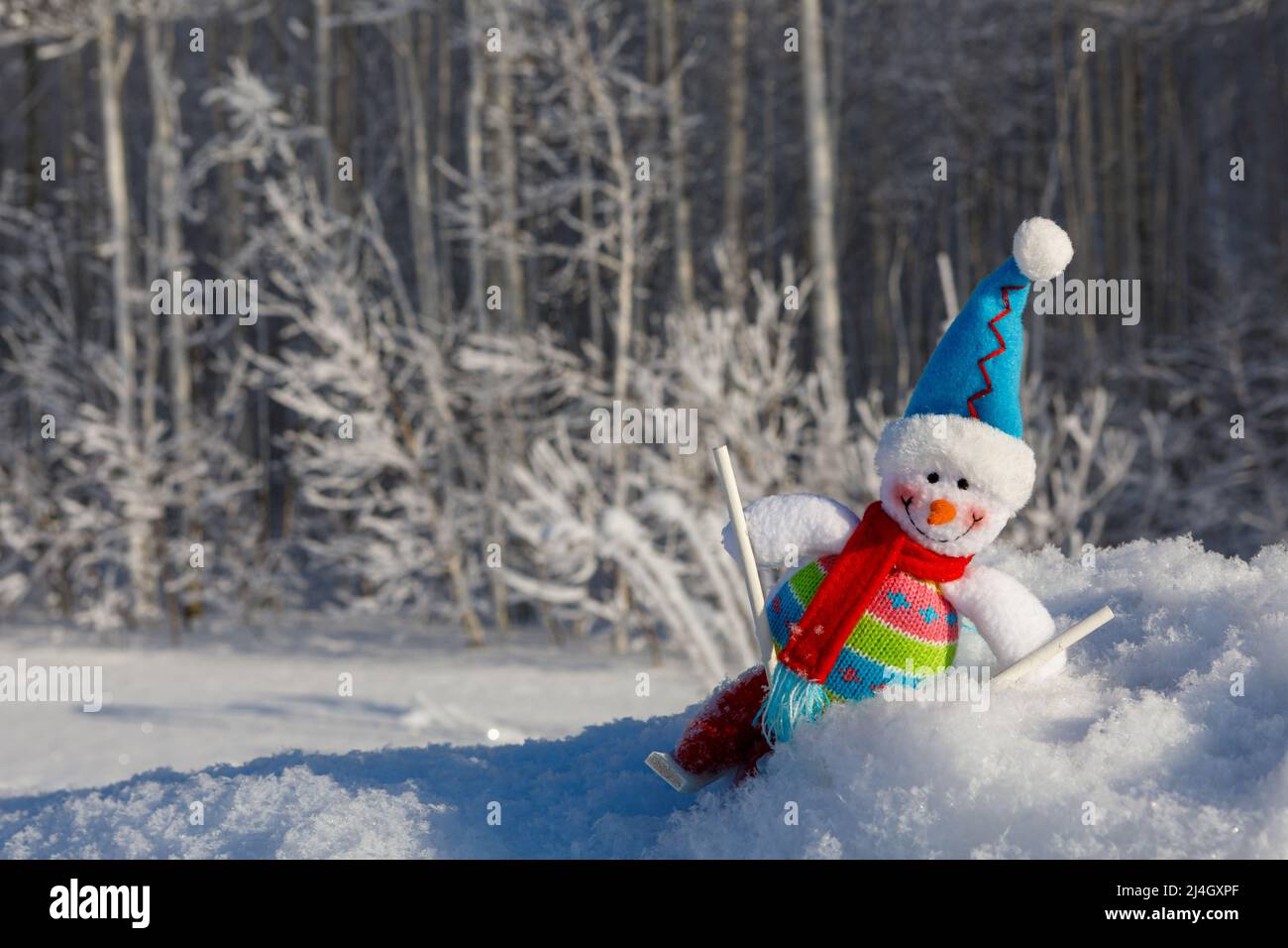 Snowman with skis hi-res stock photography and images - Alamy