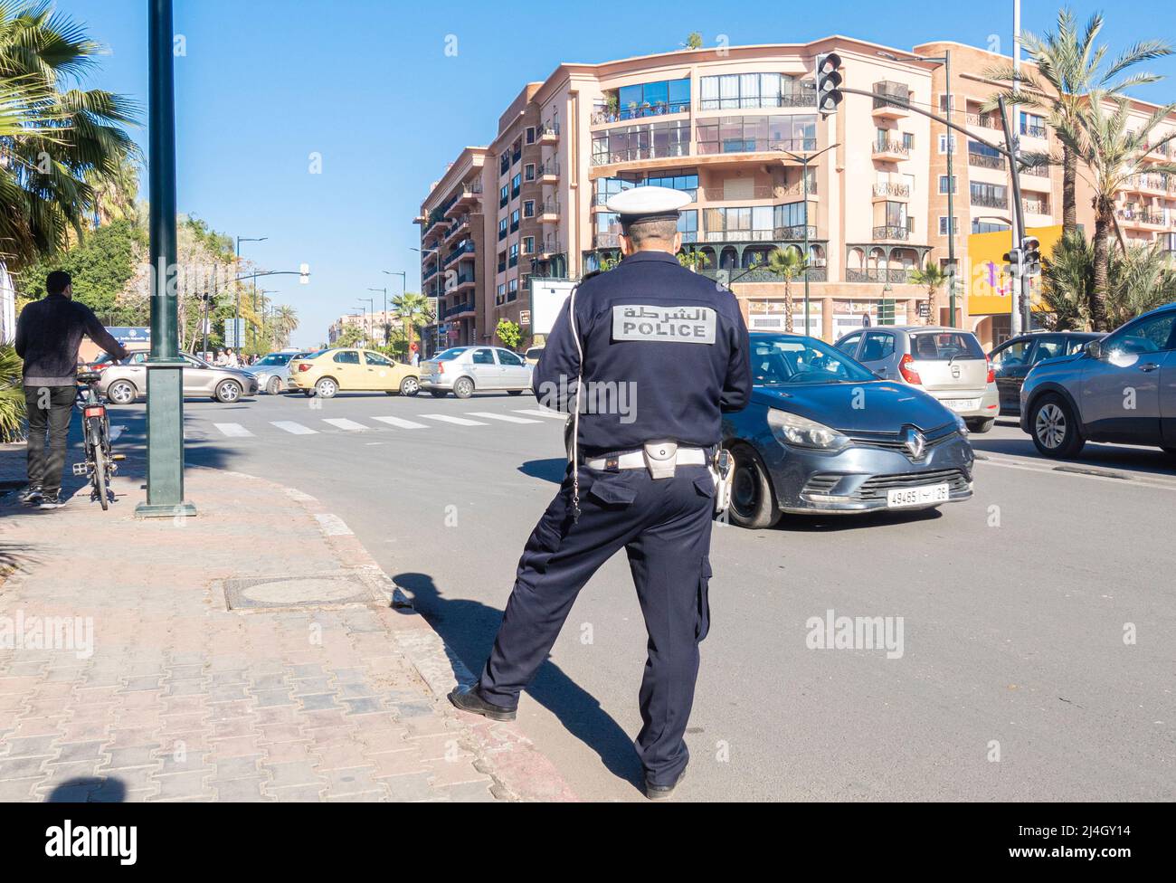 Traffic policeman at the intersection in central Marrakech, Morokko ...