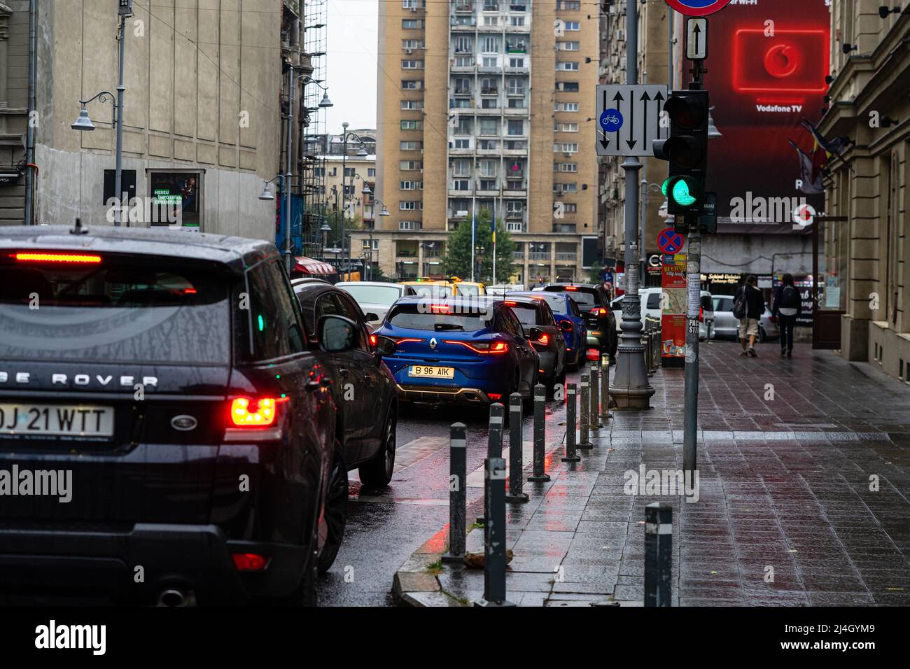 Car traffic at rush hour. Car pollution, traffic jam in Bucharest ...