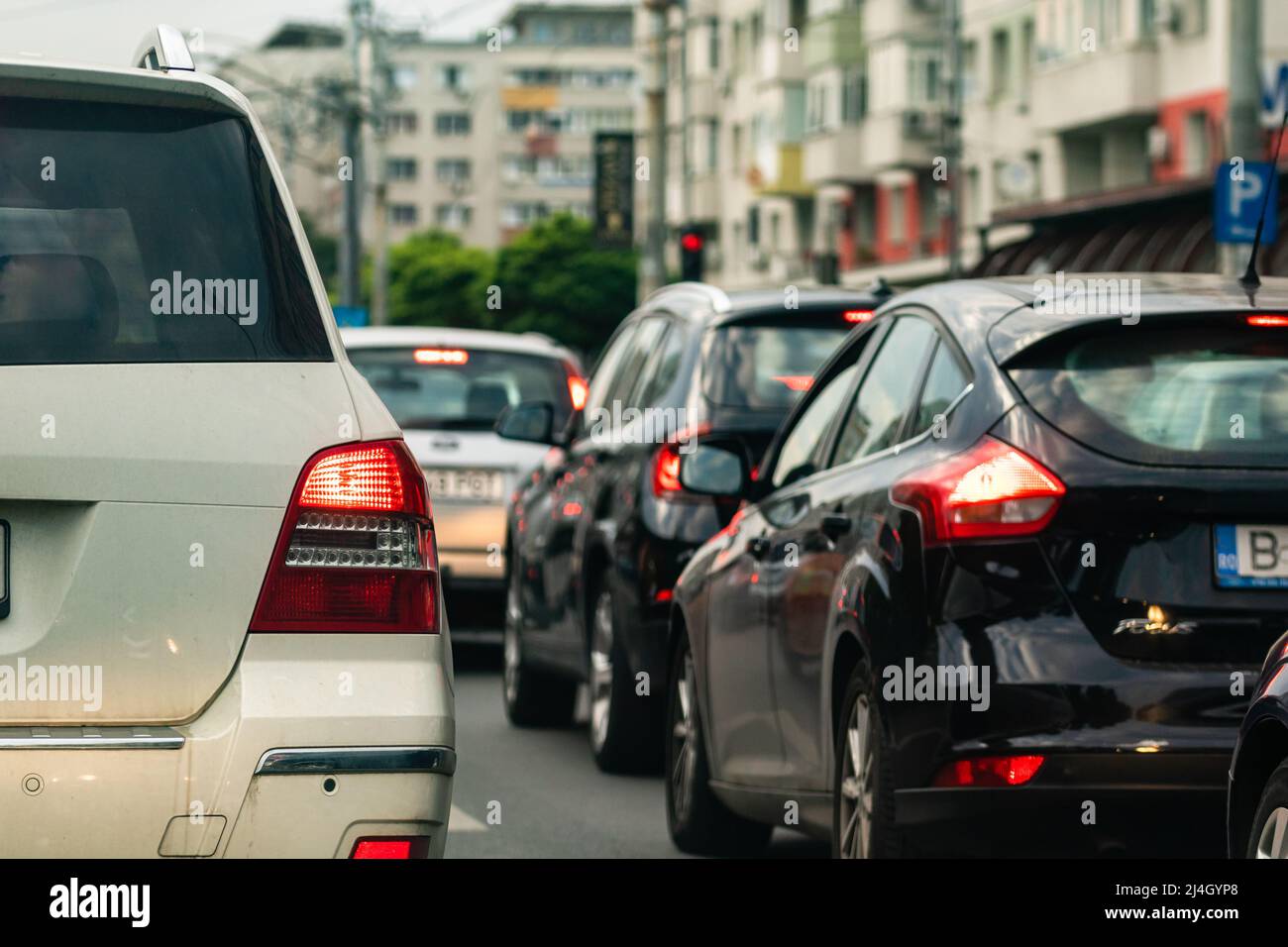 Car traffic at rush hour. Car pollution, traffic jam in Bucharest ...
