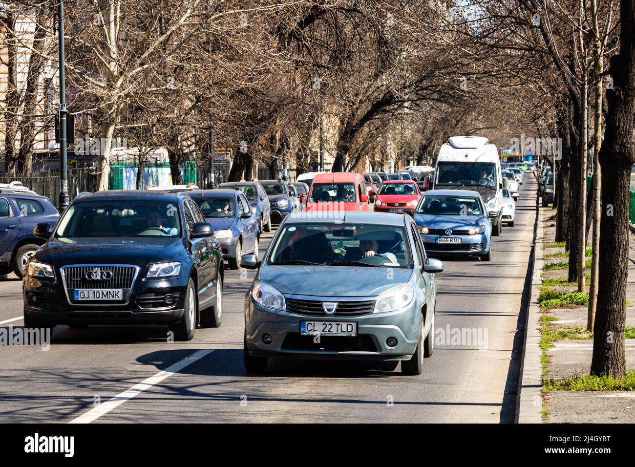 Car traffic at rush hour. Car pollution, traffic jam in Bucharest ...