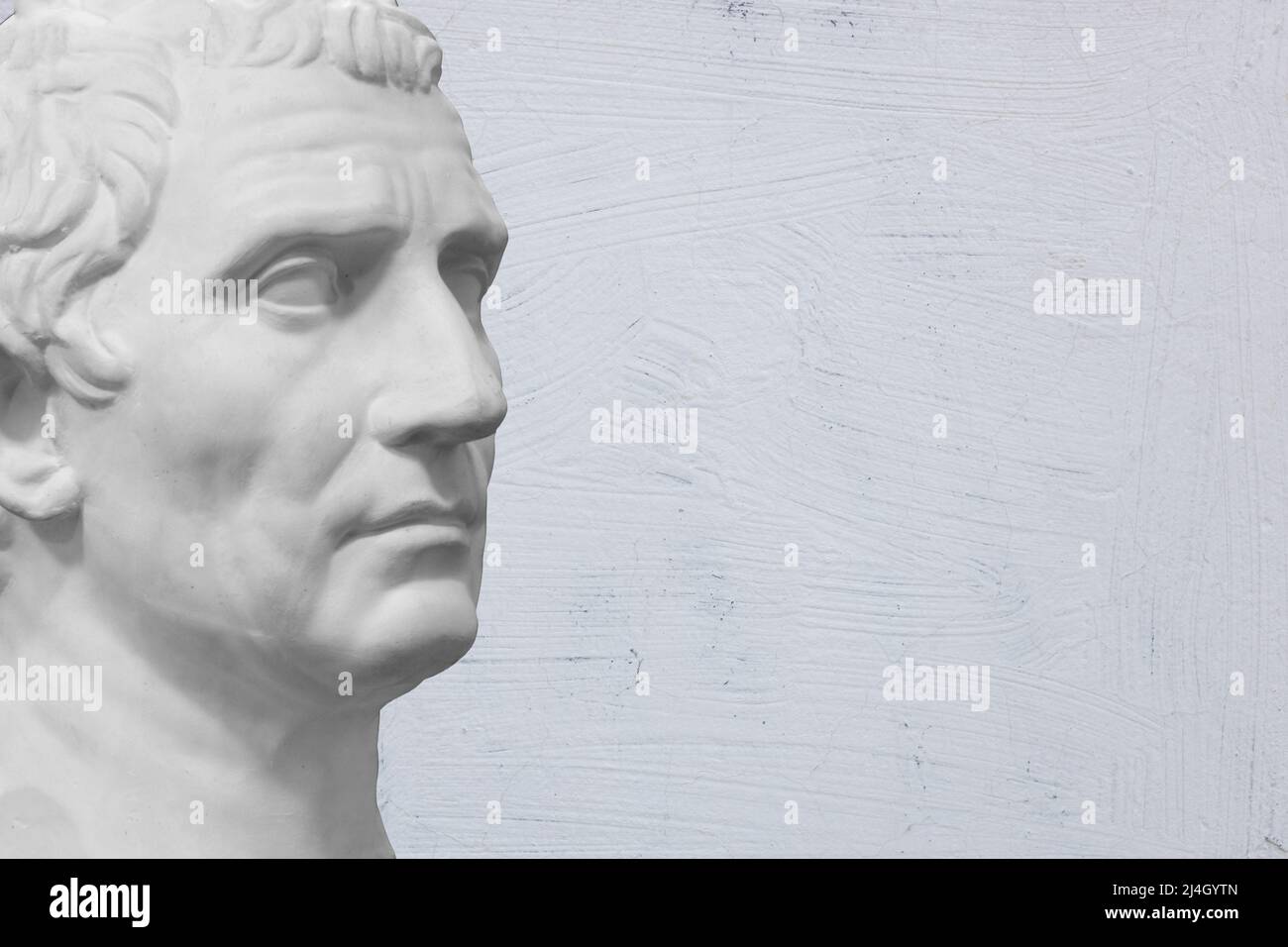 Roman sculpture on a gray background. bust of a man. High quality photo ...