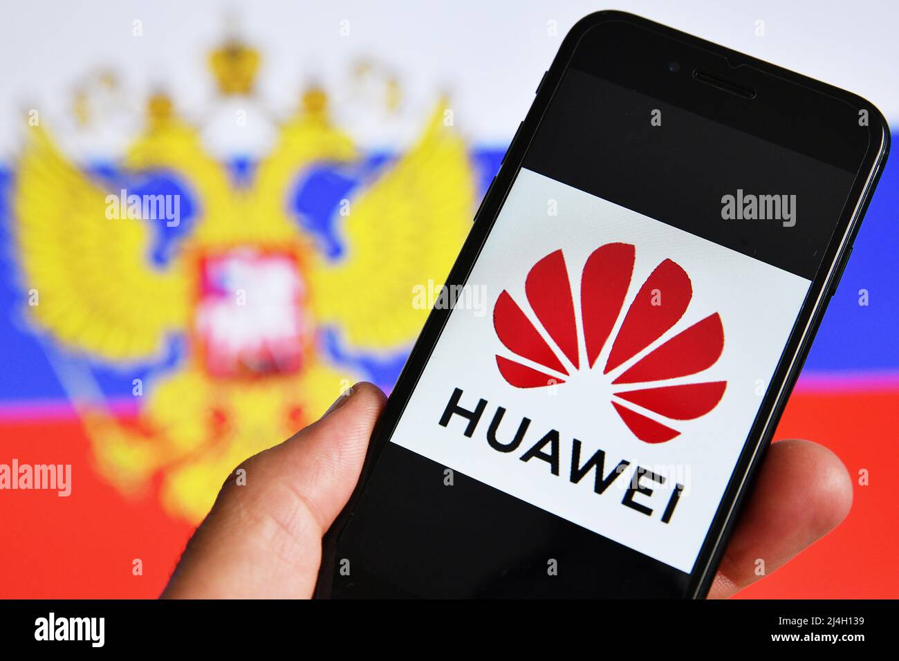 Huawei logo, Russian flag. (CTK Photo/Petr Svancara Stock Photo - Alamy