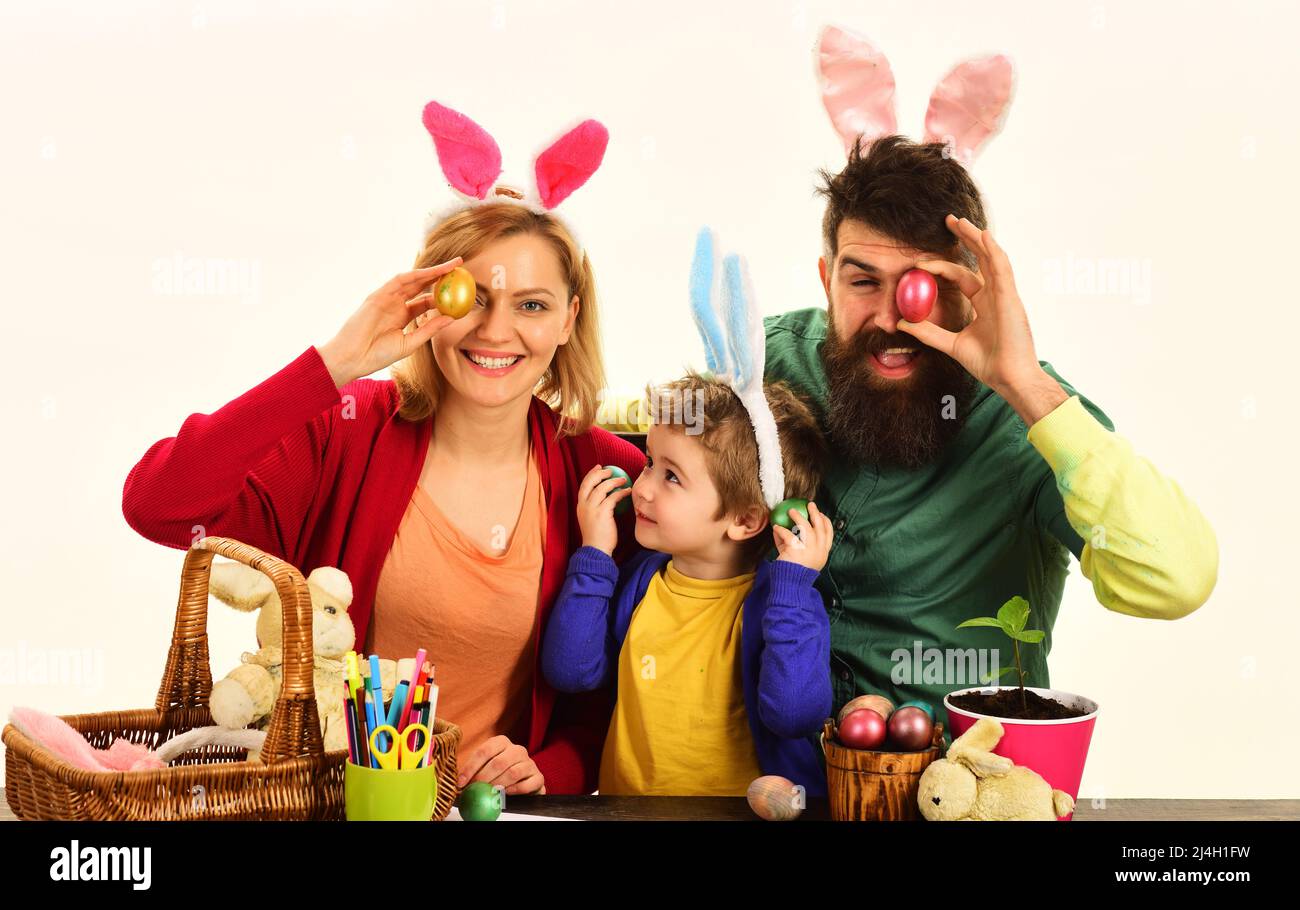 Rabbits family celebrate easter. Mother, father and son in bunny ears ...
