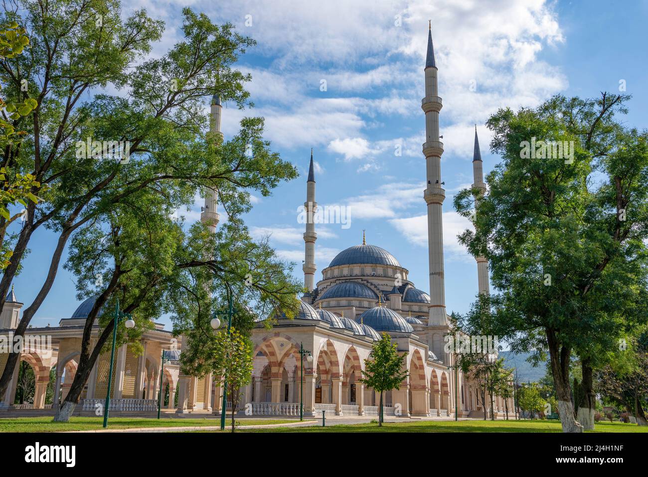 View of the Tashu-Hajji Mosque from the park on an autumn sunny day ...