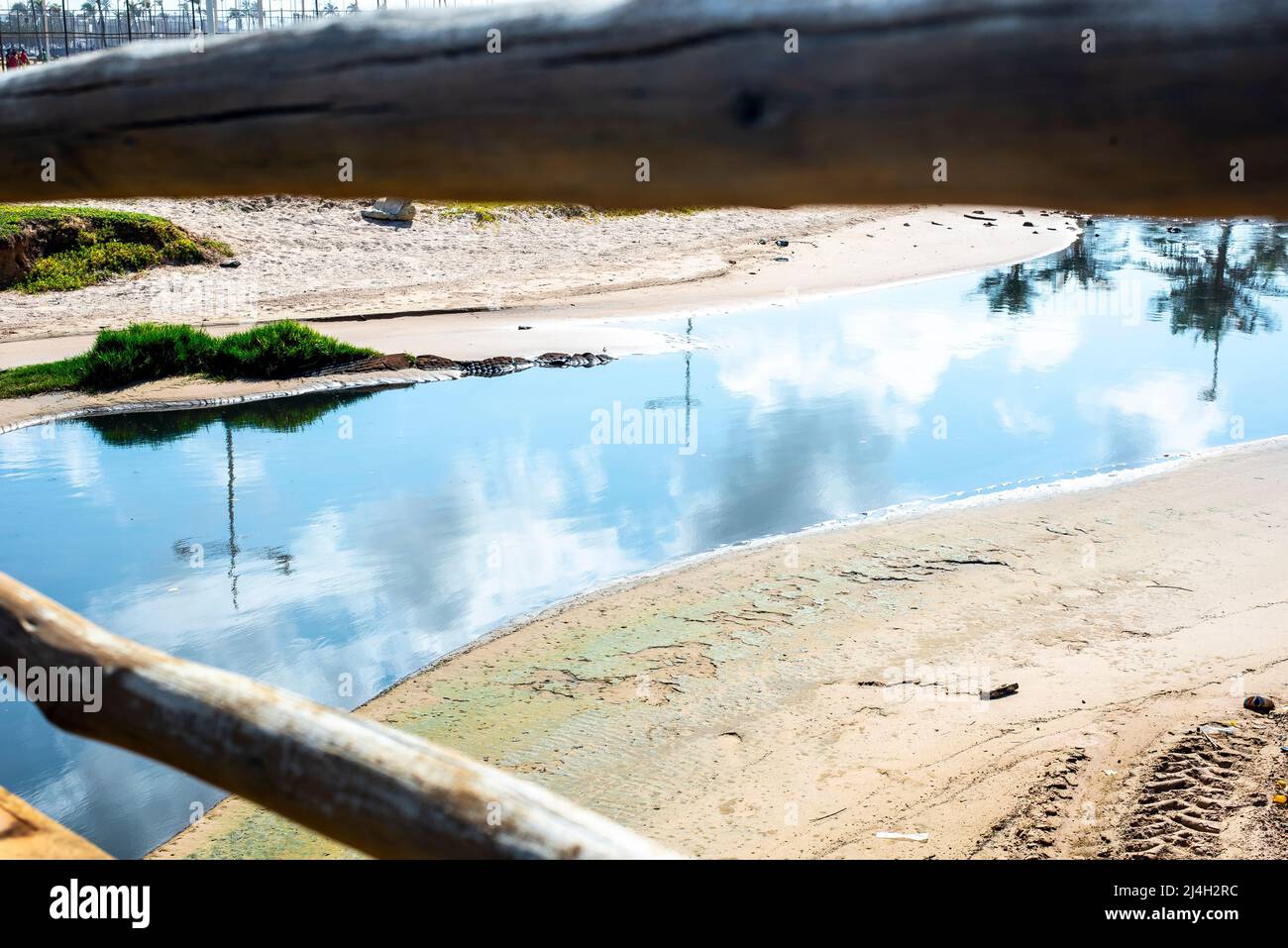 View of the river that flows into Boca do Rio beach in Salvador in the ...