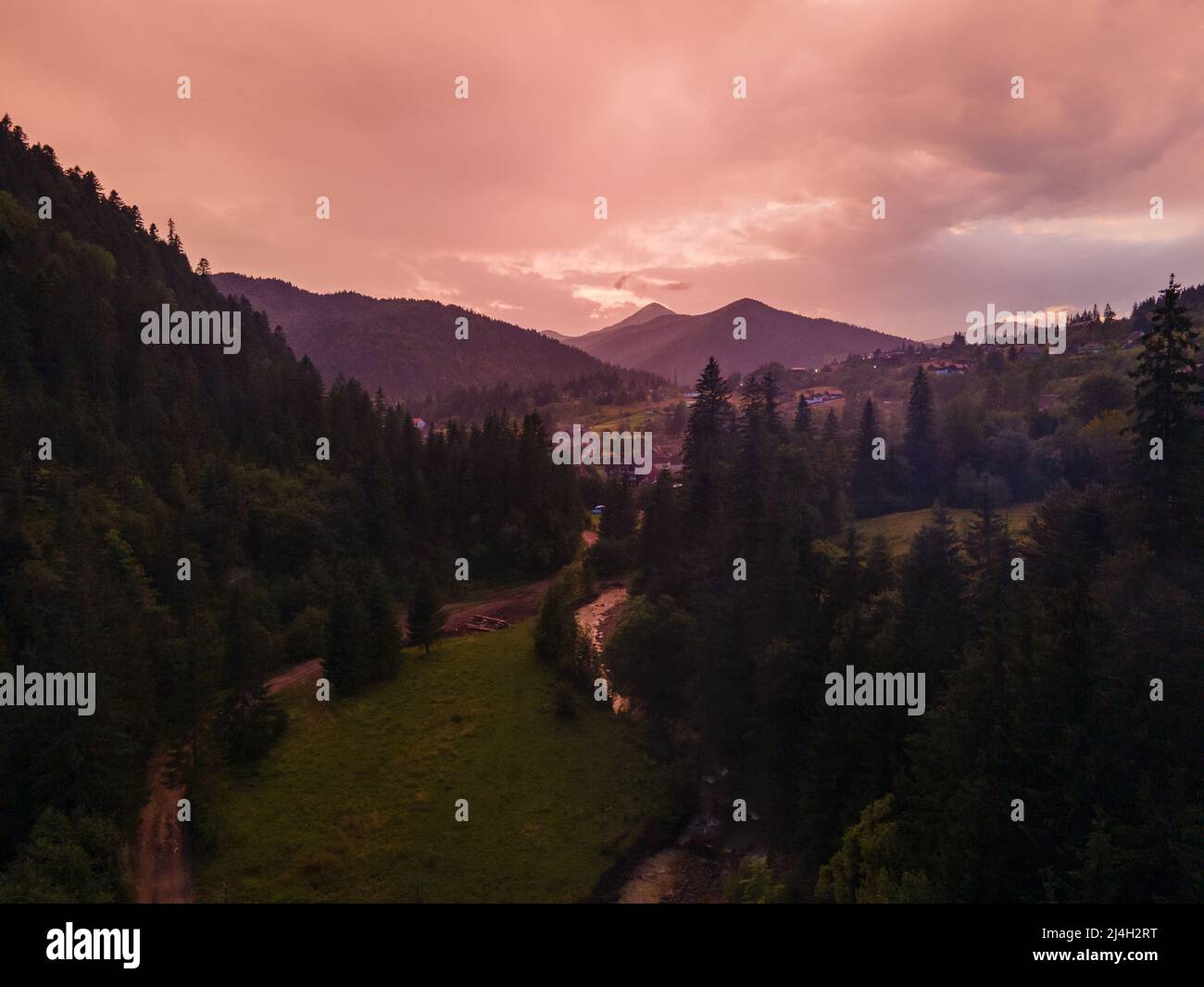 Overcast sunset above mountains hi-res stock photography and images - Alamy