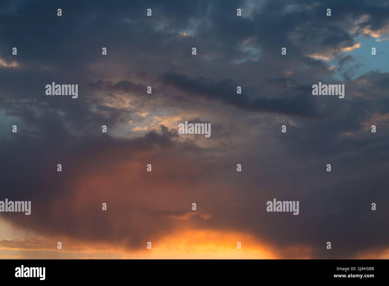 Texture of a red blue sky at sunset after rain Stock Photo - Alamy