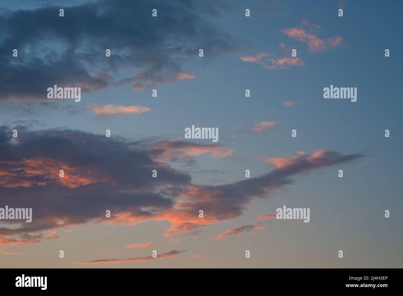 Texture of a red blue sky at sunset after rain Stock Photo - Alamy
