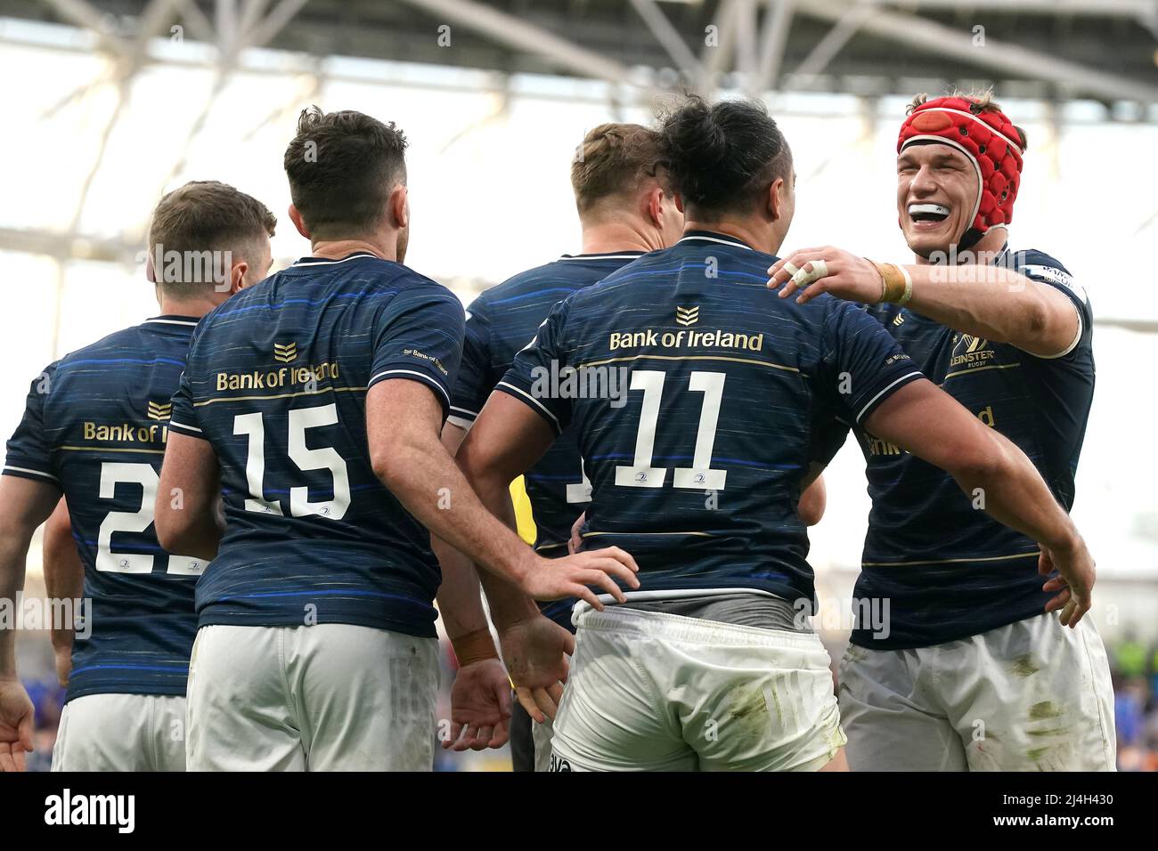Leinster's James Lowe celebrates scoring his side's seventh try and his ...