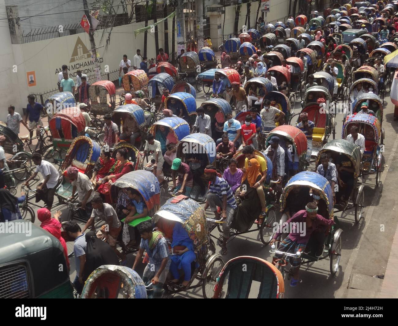 Dhaka, Bangladesh. 15th Apr, 2022. Rickshaw passengers are stuck in ...