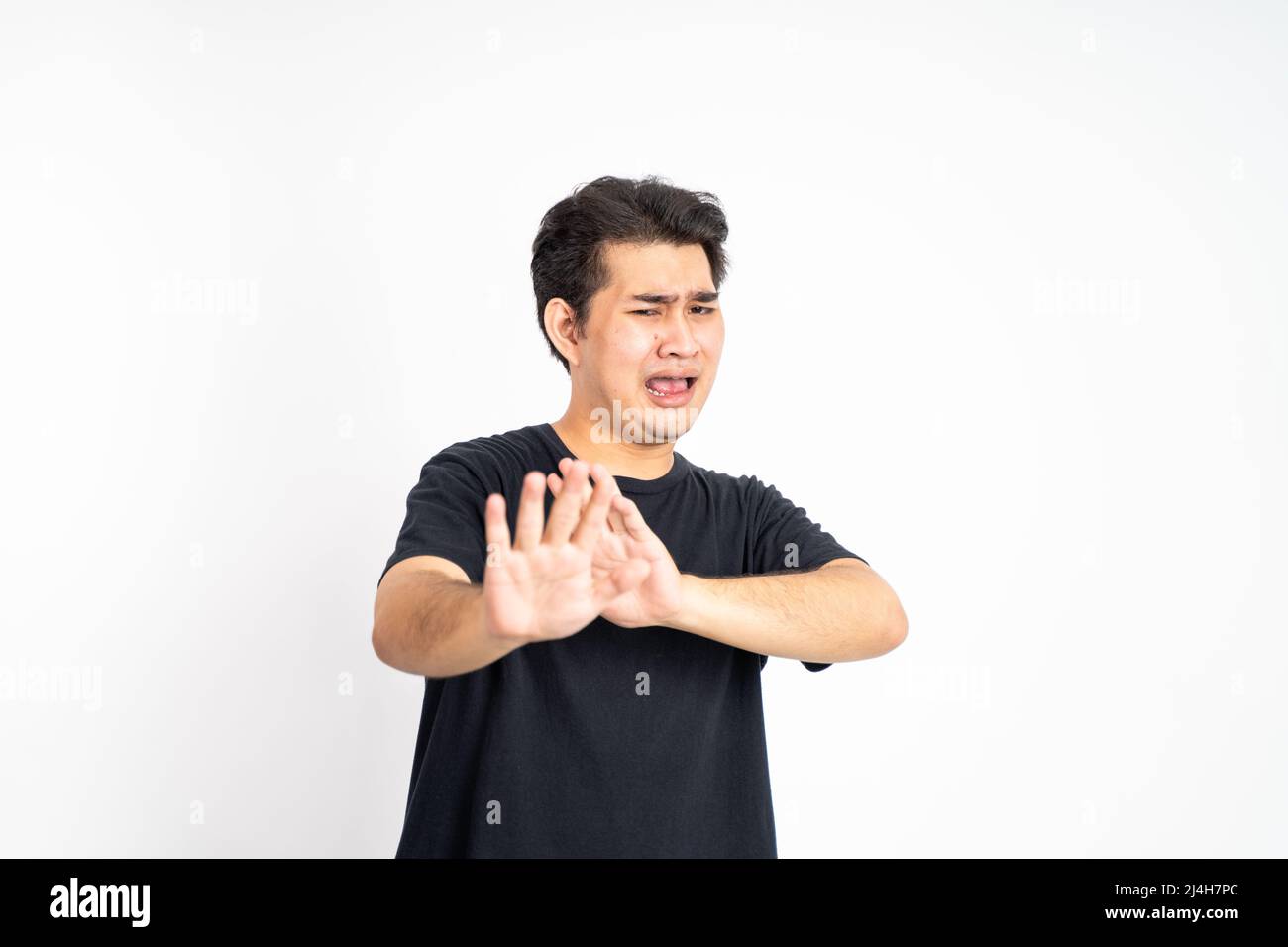 asian young young man with scared gesture on isolated Stock Photo - Alamy