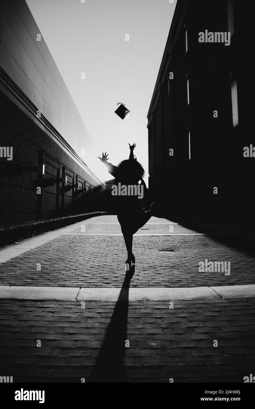Throwing Graduation Caps In The Air Silhouette