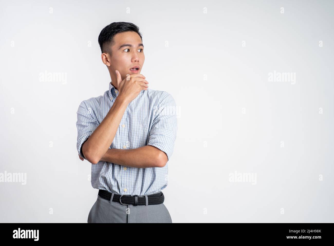 Man curious thinking hand gesture hi-res stock photography and images ...