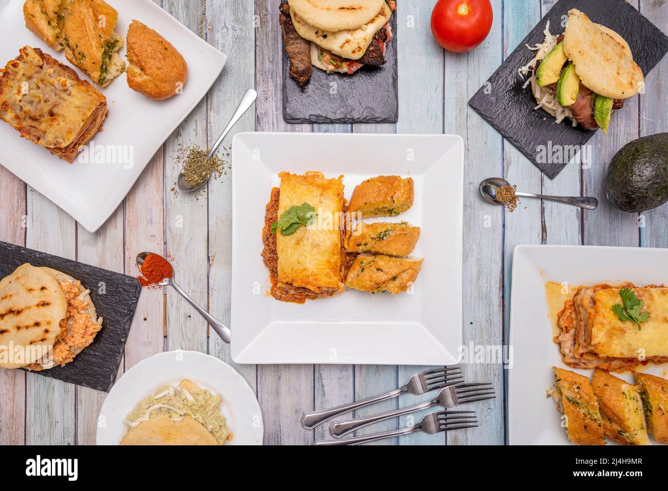 Venezuelan and Italian fast food dishes and appetizers, assorted arepas ...